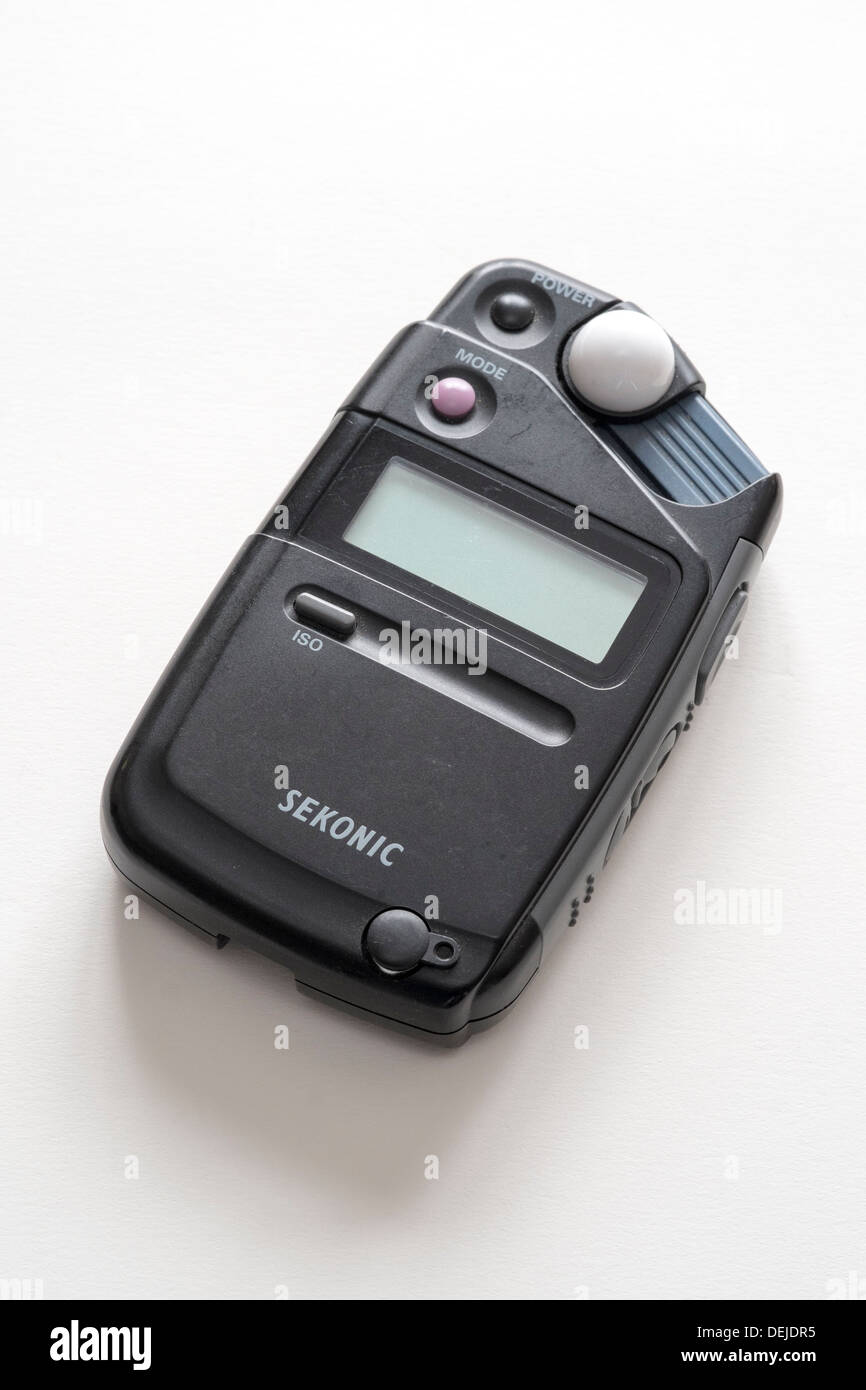 Old digital Sekonic hand held photographic light meter on white ...