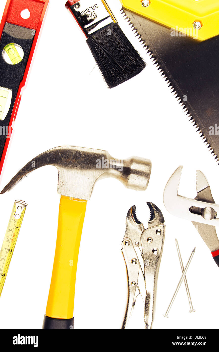 Varied tools on plain background Stock Photo - Alamy