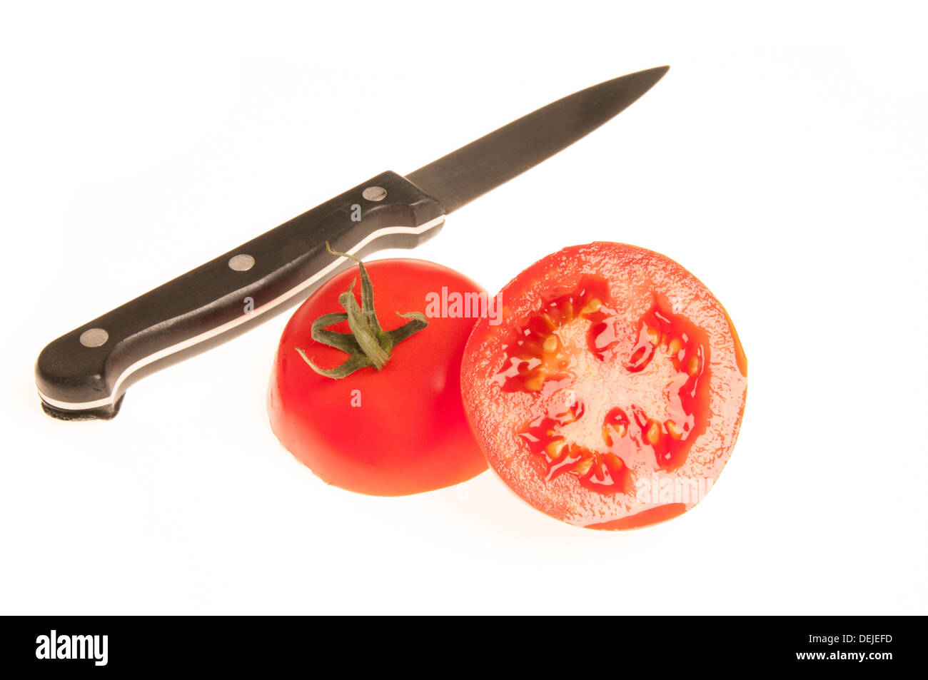 Chopping tomatoes Cut Out Stock Images & Pictures - Alamy