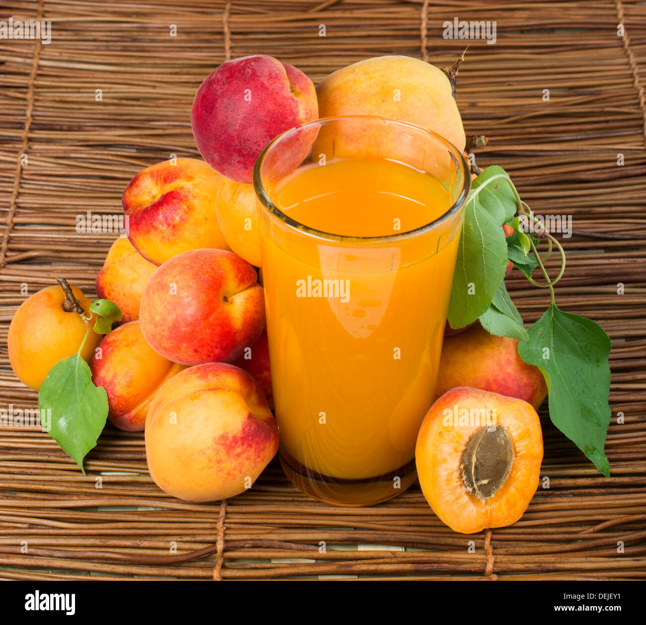 Glass apricot juice and apricot fruit. White isolated Studio shot Stock ...