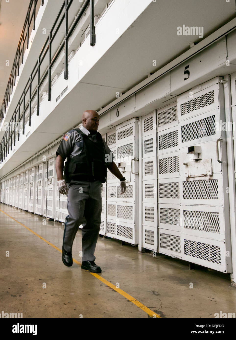 Prison guards inside prison unit near Houston, Texas walk through cells ...