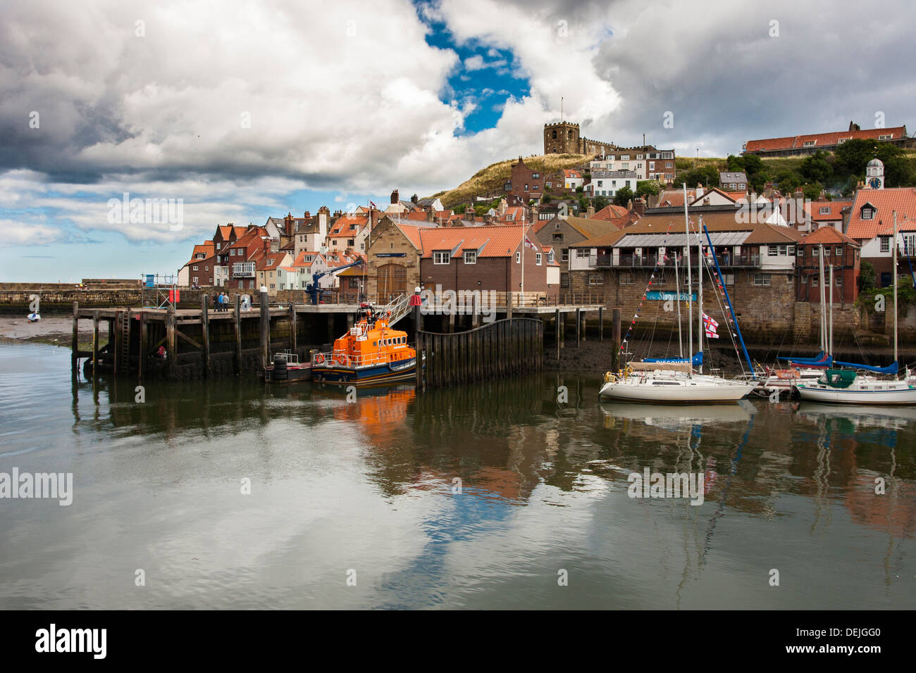 Whitby harbour with lifeboat Stock Photo - Alamy