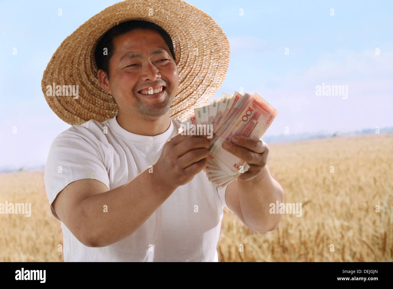 Farmer counting money in field hi-res stock photography and images - Alamy