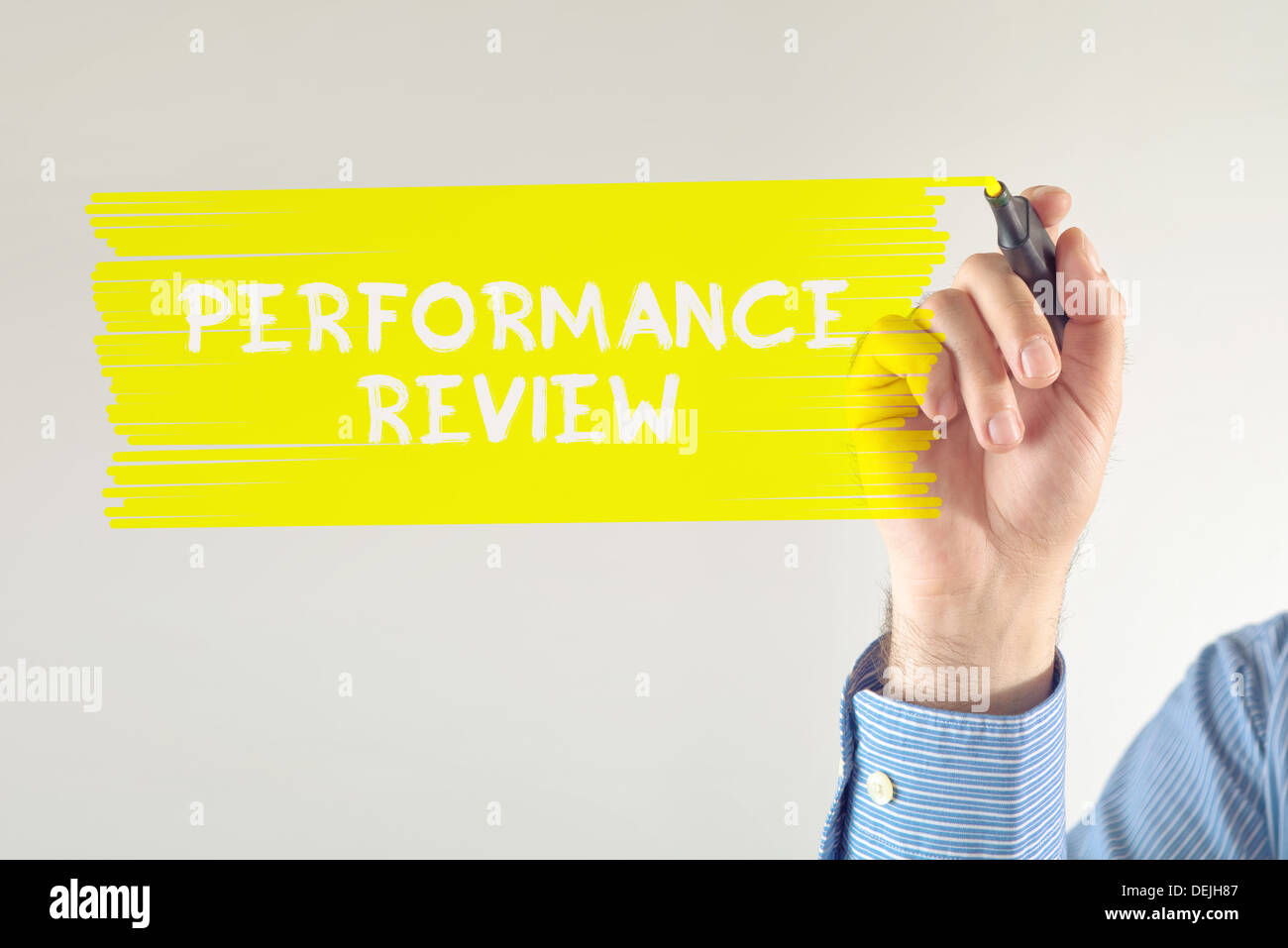 Business performance review. Businessman writing note with marker pen ...