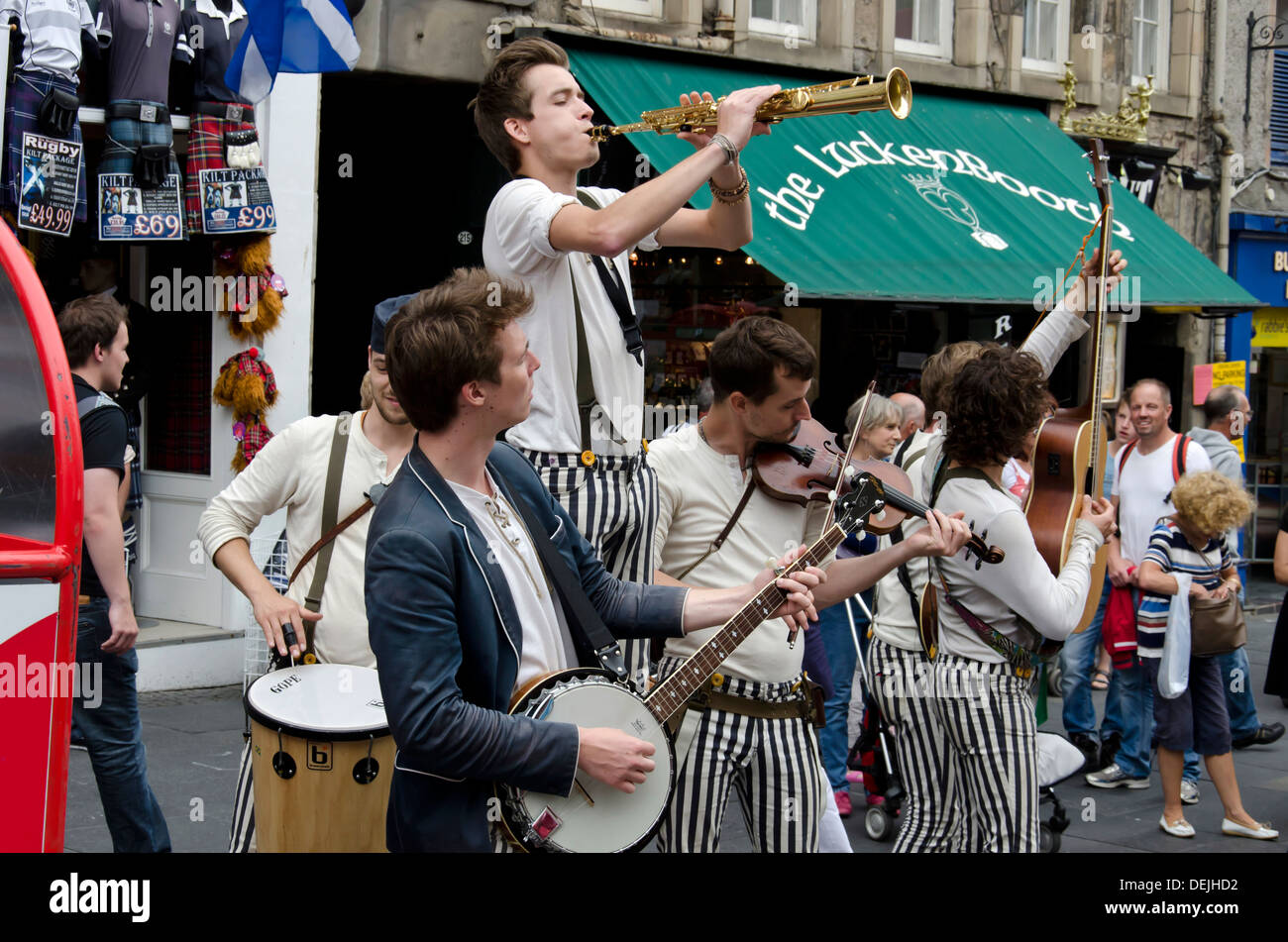 Band of musicians promoting their show at the Festival Fringe in the ...