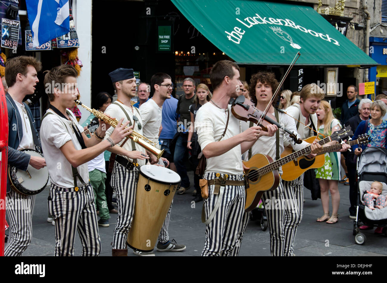 Band of musicians promoting their show at the Festival Fringe in the ...