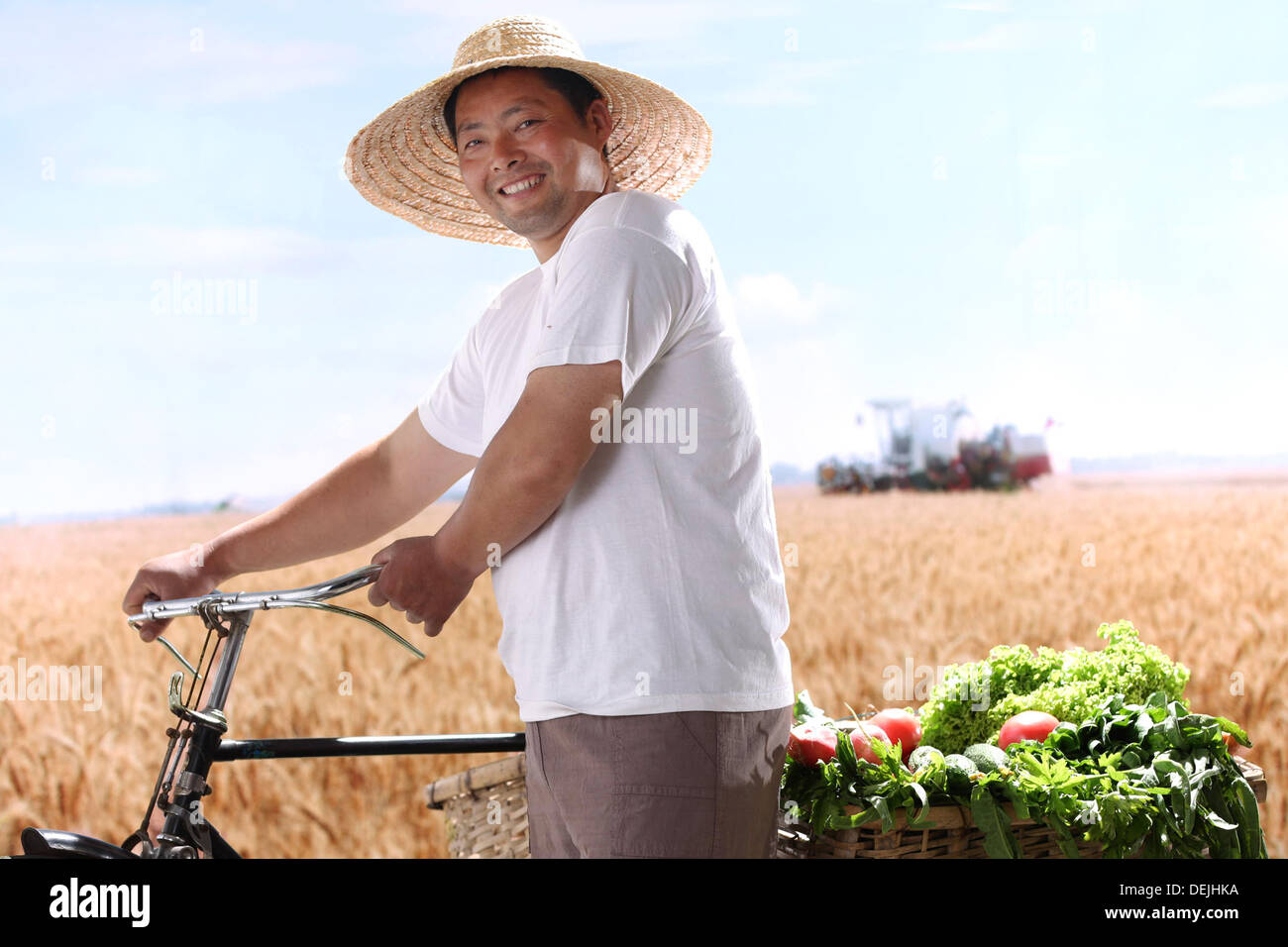 Farmer walking bike vegetable hi-res stock photography and images - Alamy
