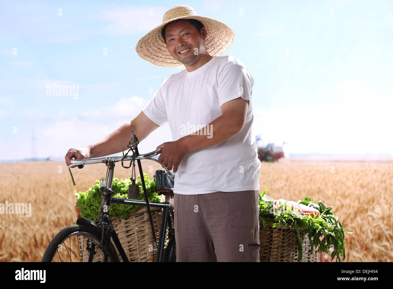 Farmer walking bike vegetable hi-res stock photography and images - Alamy