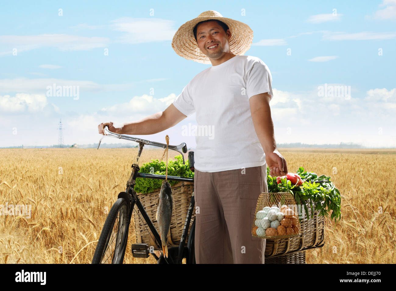 Farmer walking bike vegetable hi-res stock photography and images - Alamy