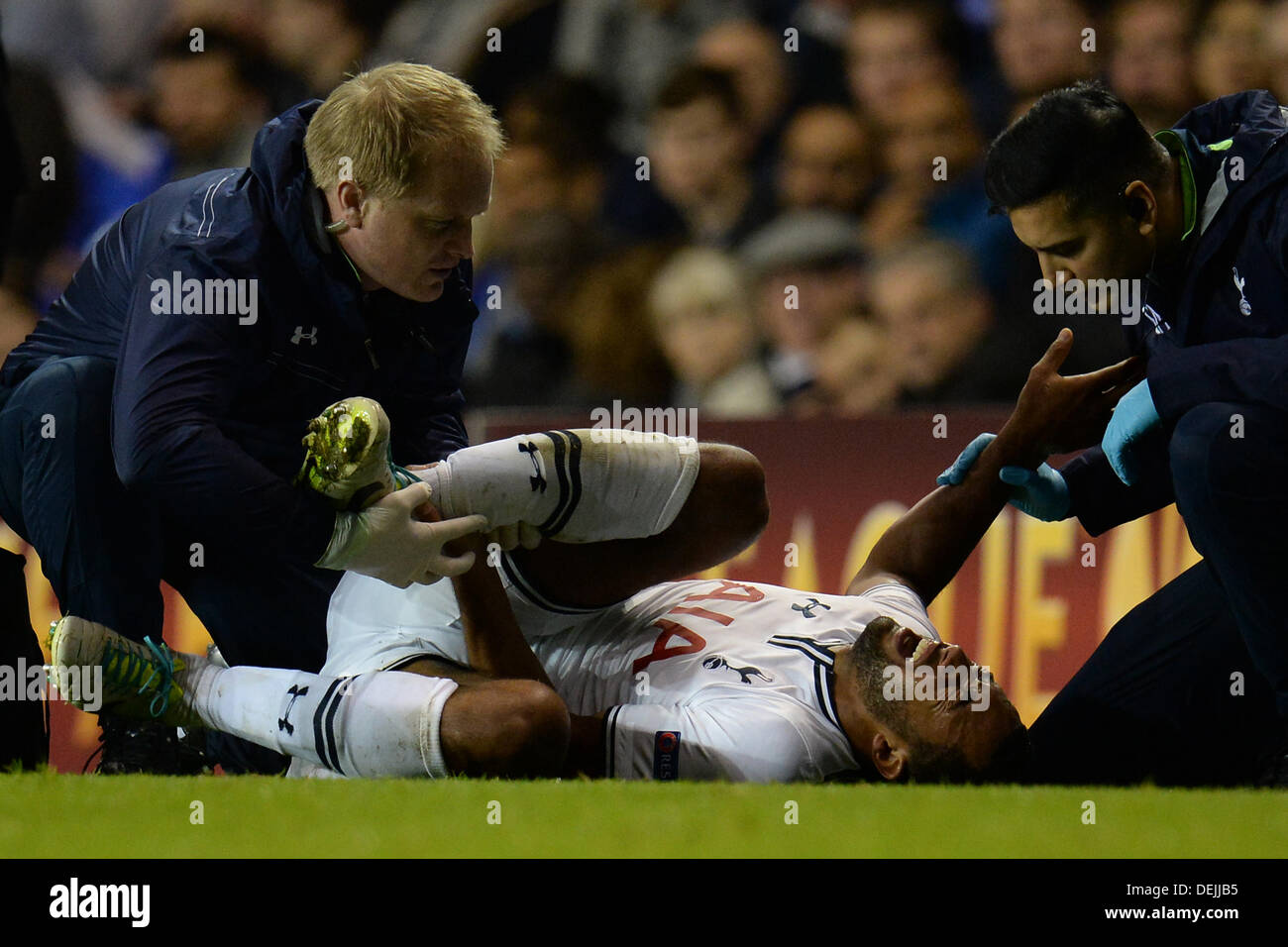 LONDON, ENGLAND - September 19: Tottenham's Mousa Dembele sustains an ...