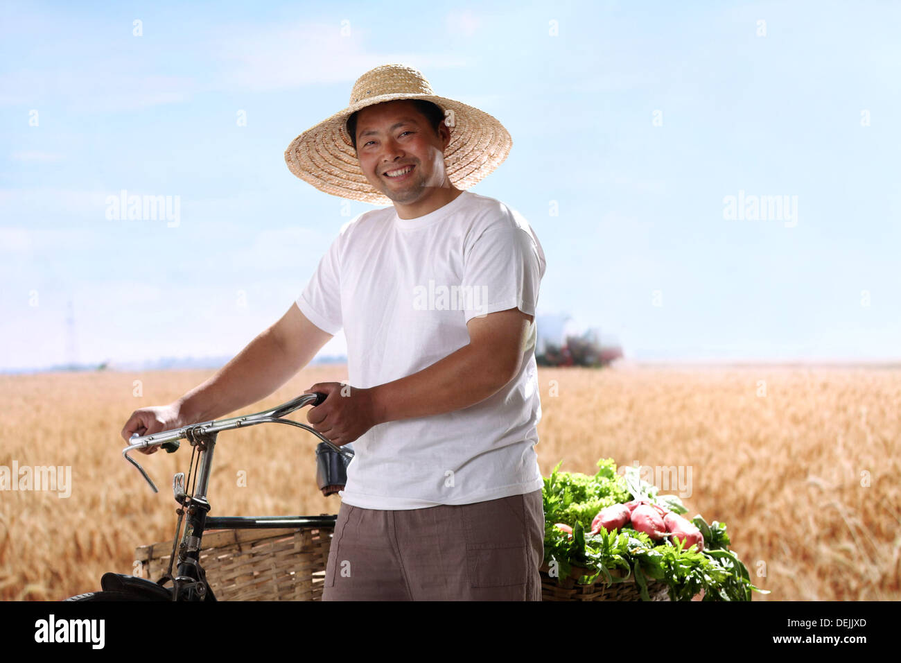 Farmer walking bike with vegetable Stock Photo - Alamy