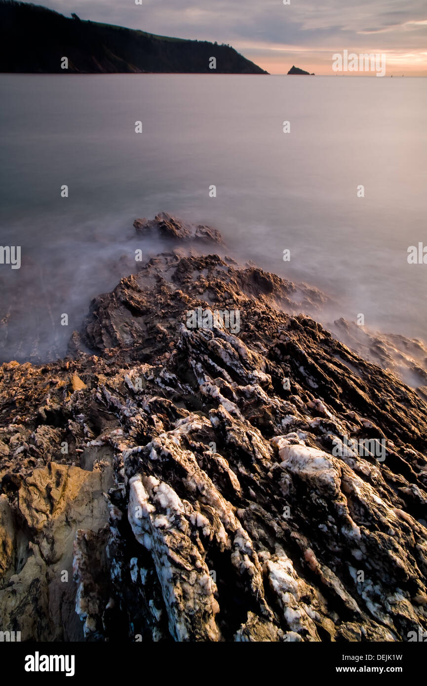 Rocks leading into Deadmans Cove Dartmouth Devon Stock Photo - Alamy