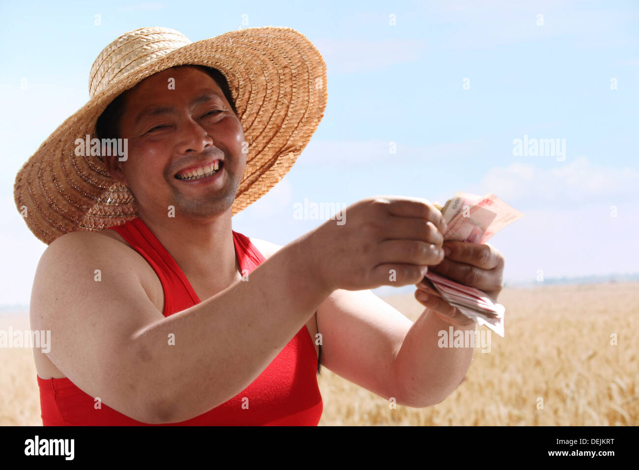 Farmer counting money in field hi-res stock photography and images - Alamy