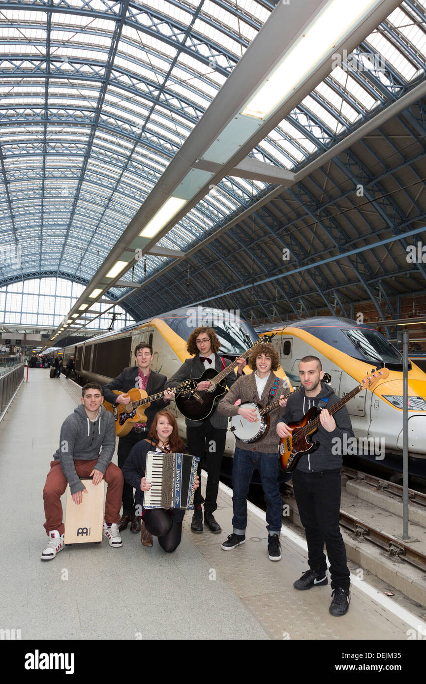 Buskers "Jamie Thorn and the Mystery Pacific" play to passengers at the ...