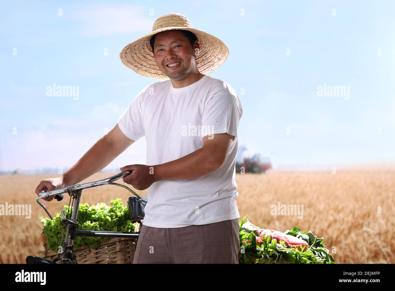 Farmer walking bike with vegetable Stock Photo - Alamy
