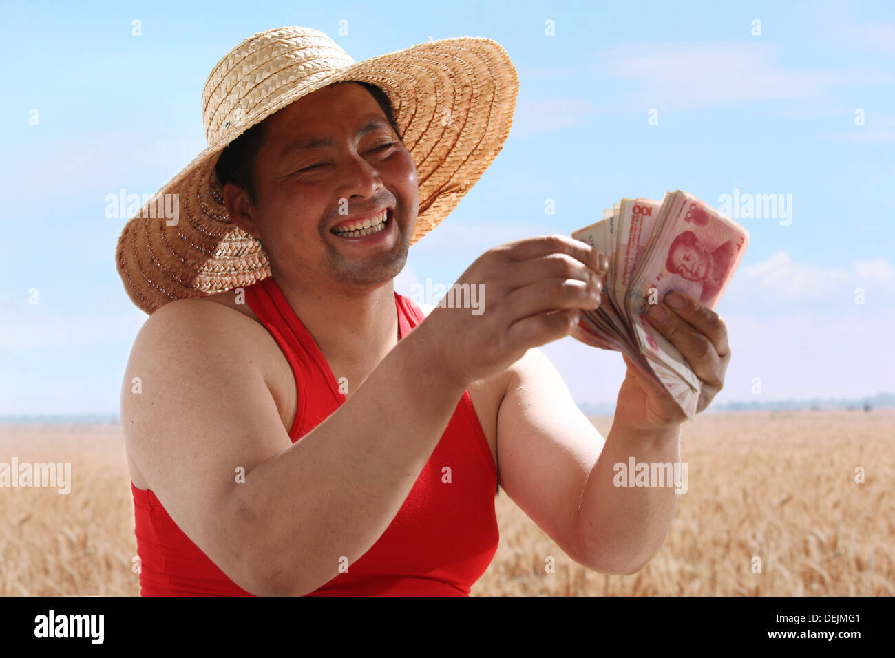 Farmer counting money in field hi-res stock photography and images - Alamy