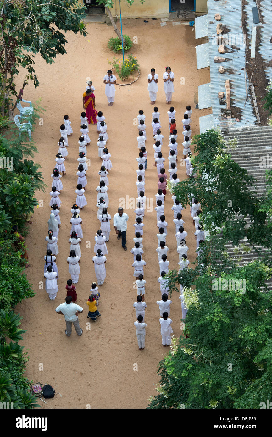 Children school assembly sitting hi-res stock photography and images ...