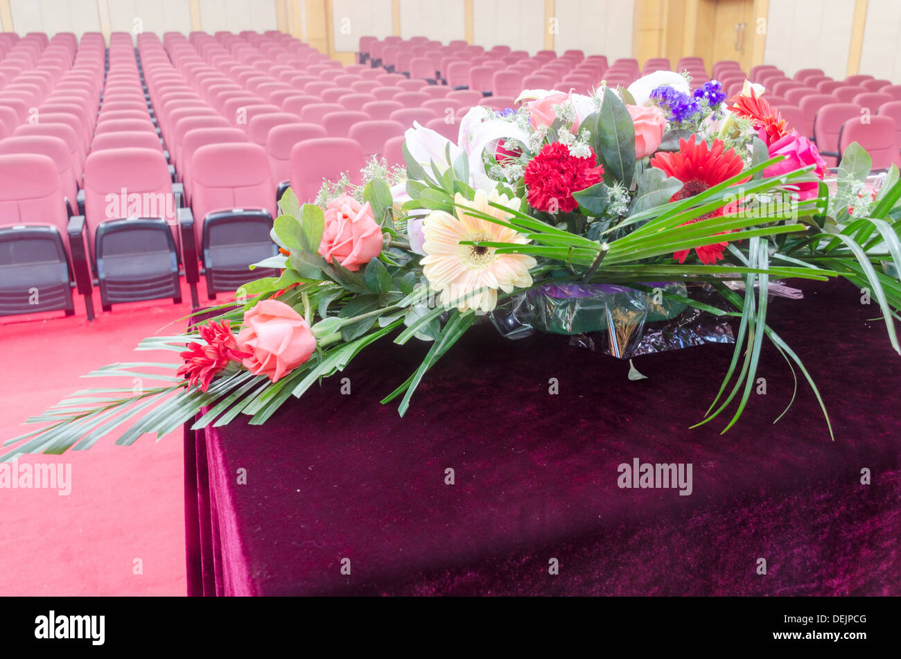 Empty hall for presentation with red armchairs Stock Photo - Alamy