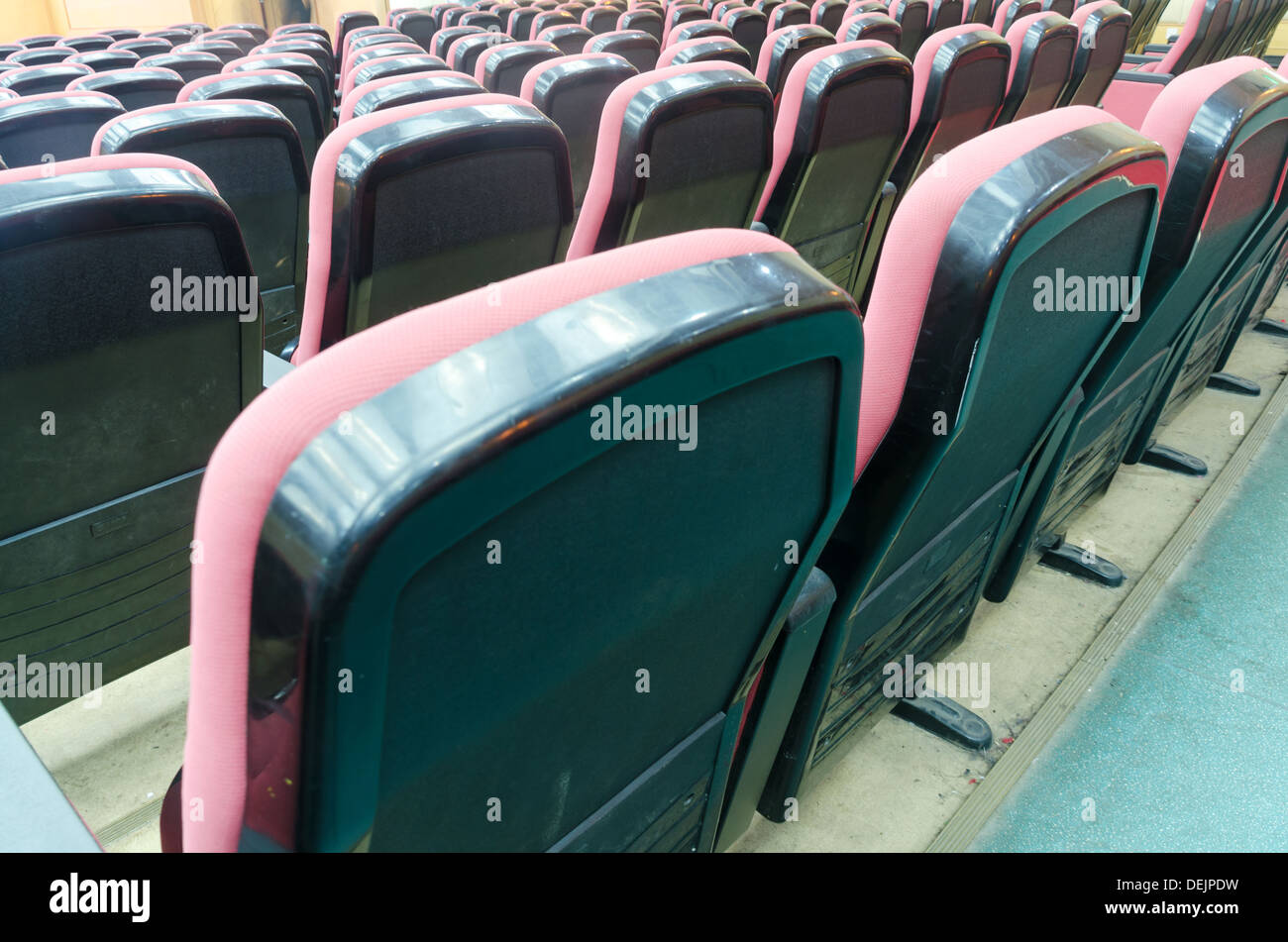 Empty hall for presentation with red armchairs Stock Photo - Alamy