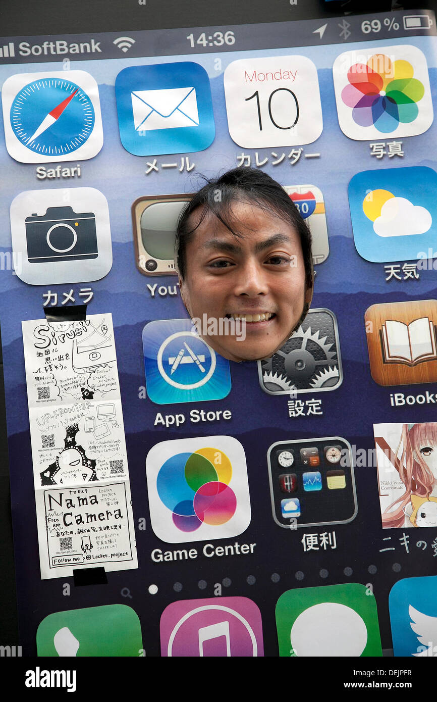 Tokyo, Japan. 20th Sept, 2013. A man wears a iPhone custom during the ...