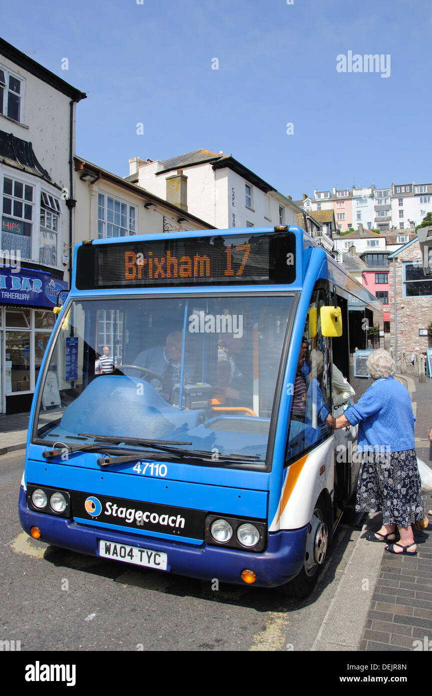 elderly woman boarding bus, Brixham, Devon, England, Uk Stock Photo - Alamy