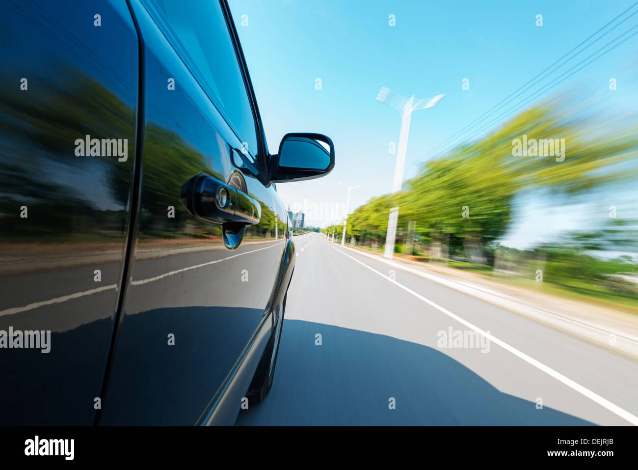 car on the road with motion blur background Stock Photo - Alamy