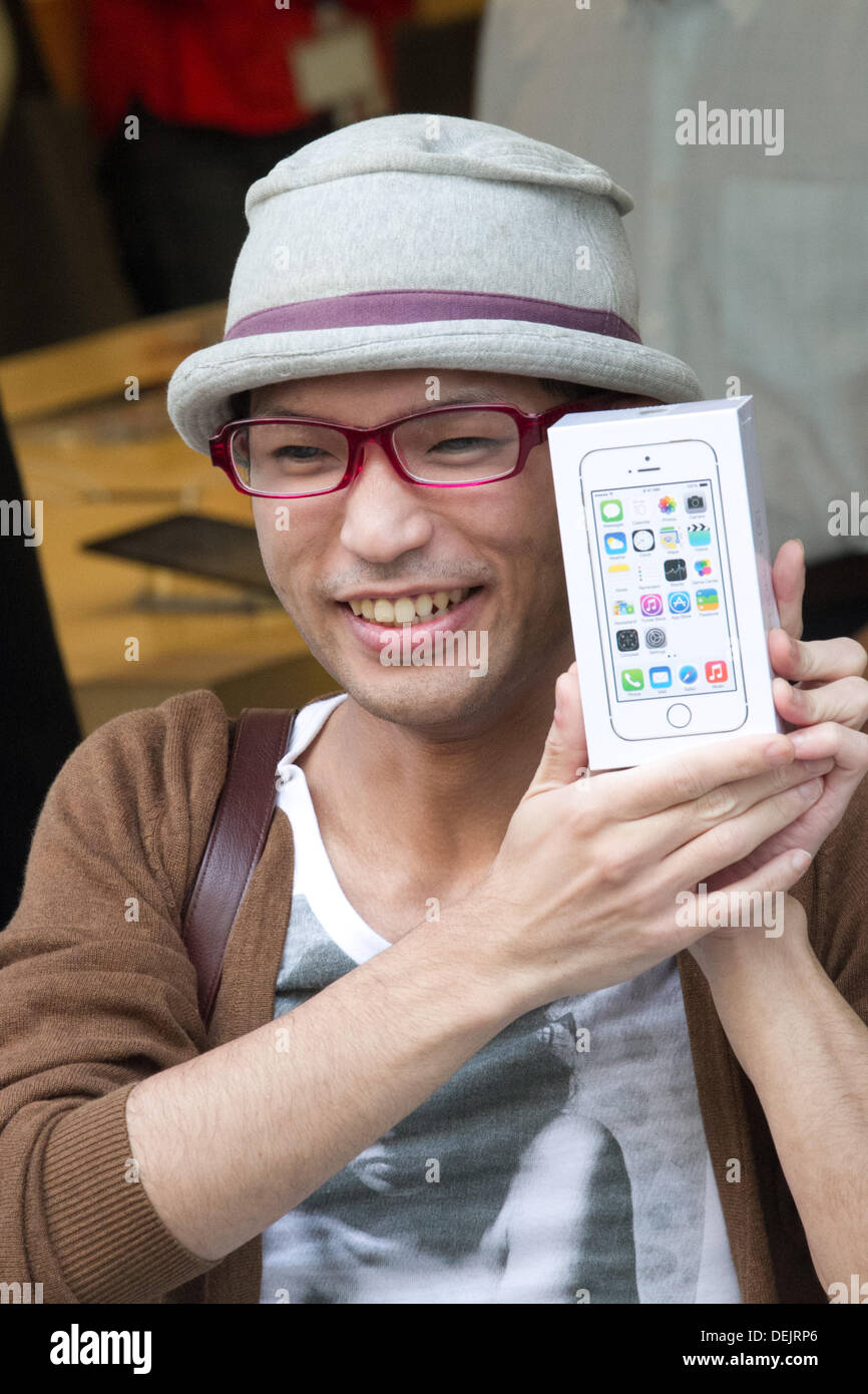 Tokyo, Japan. 20th Sep, 2013. One of the first people to get Apple's ...