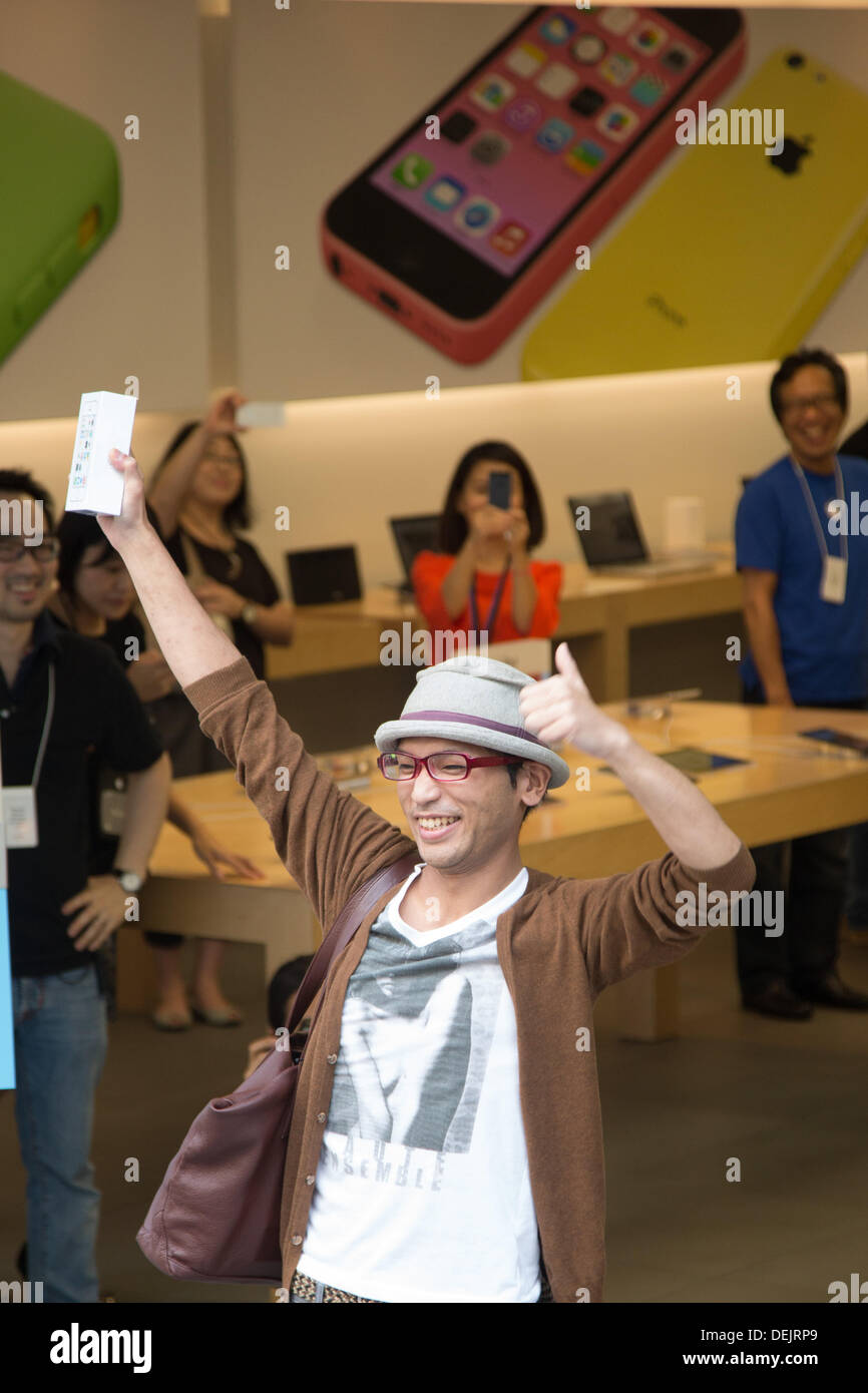 Tokyo, Japan. 20th Sep, 2013. One of the first people to get Apple's ...