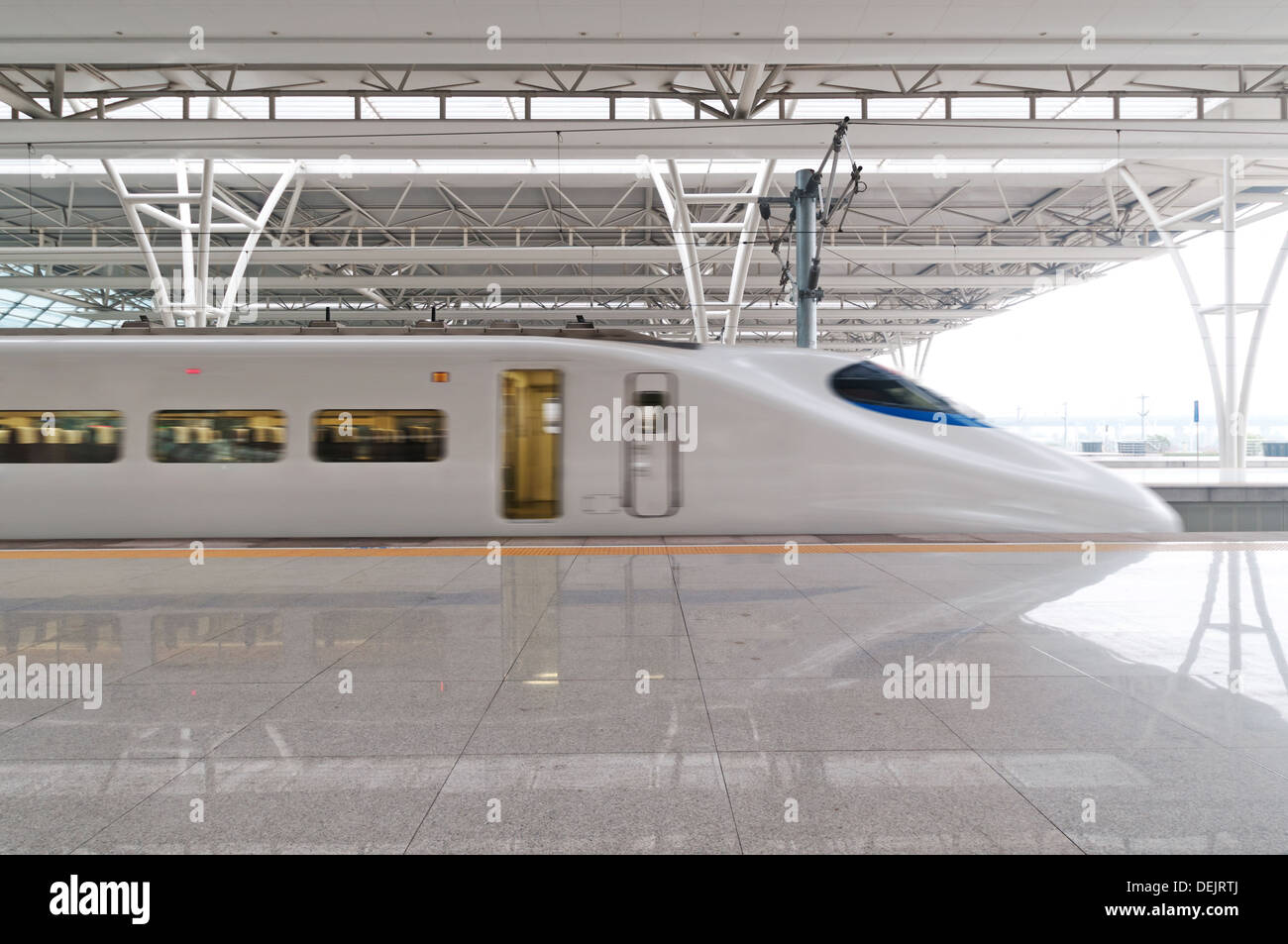 train stop at railway station Stock Photo - Alamy