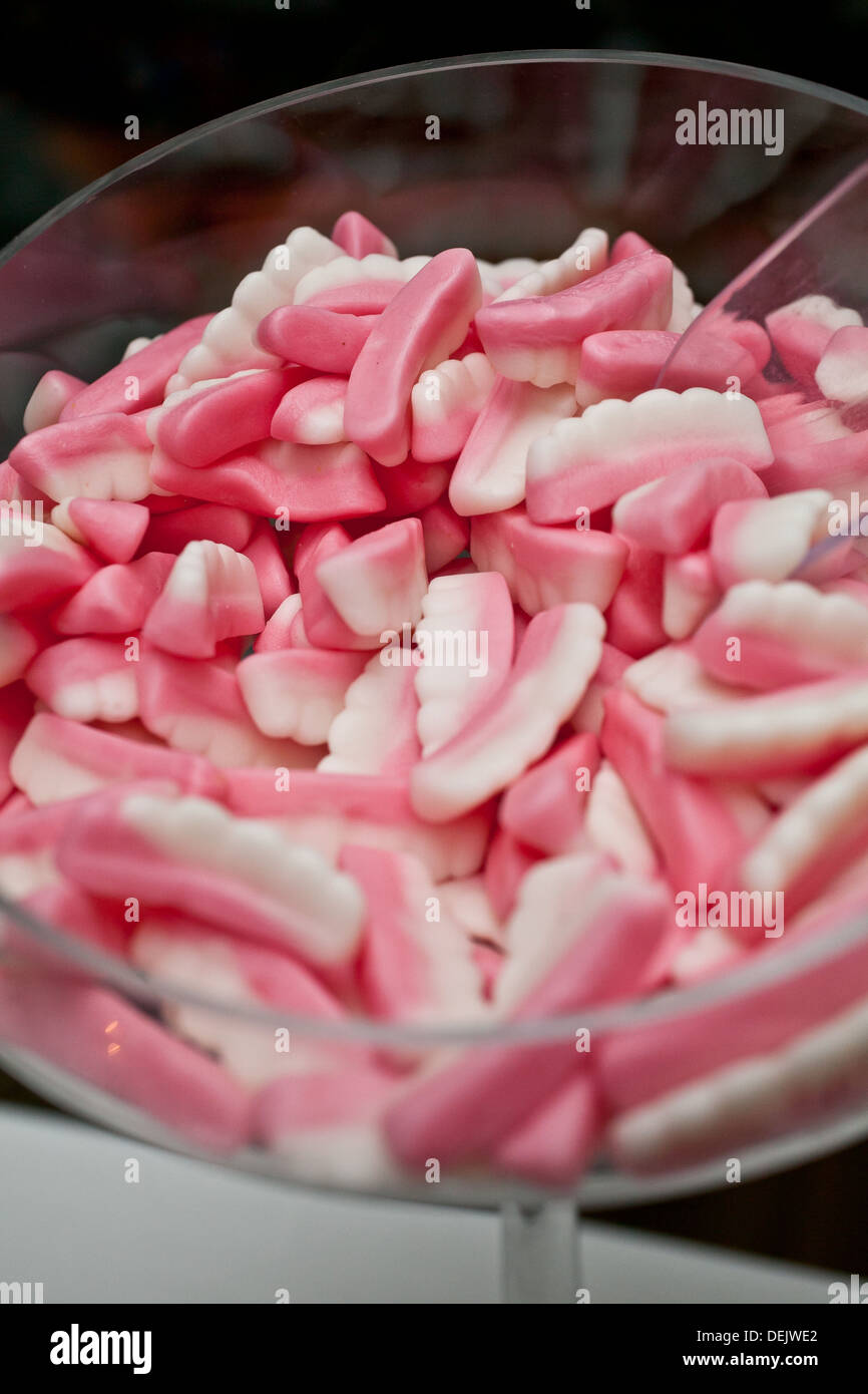 Pink and white candy teeth Stock Photo - Alamy