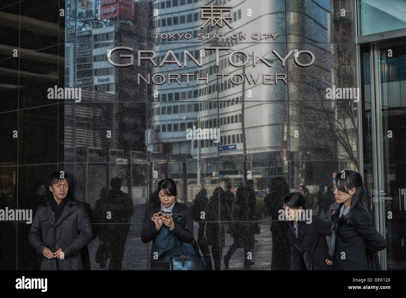 Employees standing outside Tokyo station Stock Photo - Alamy