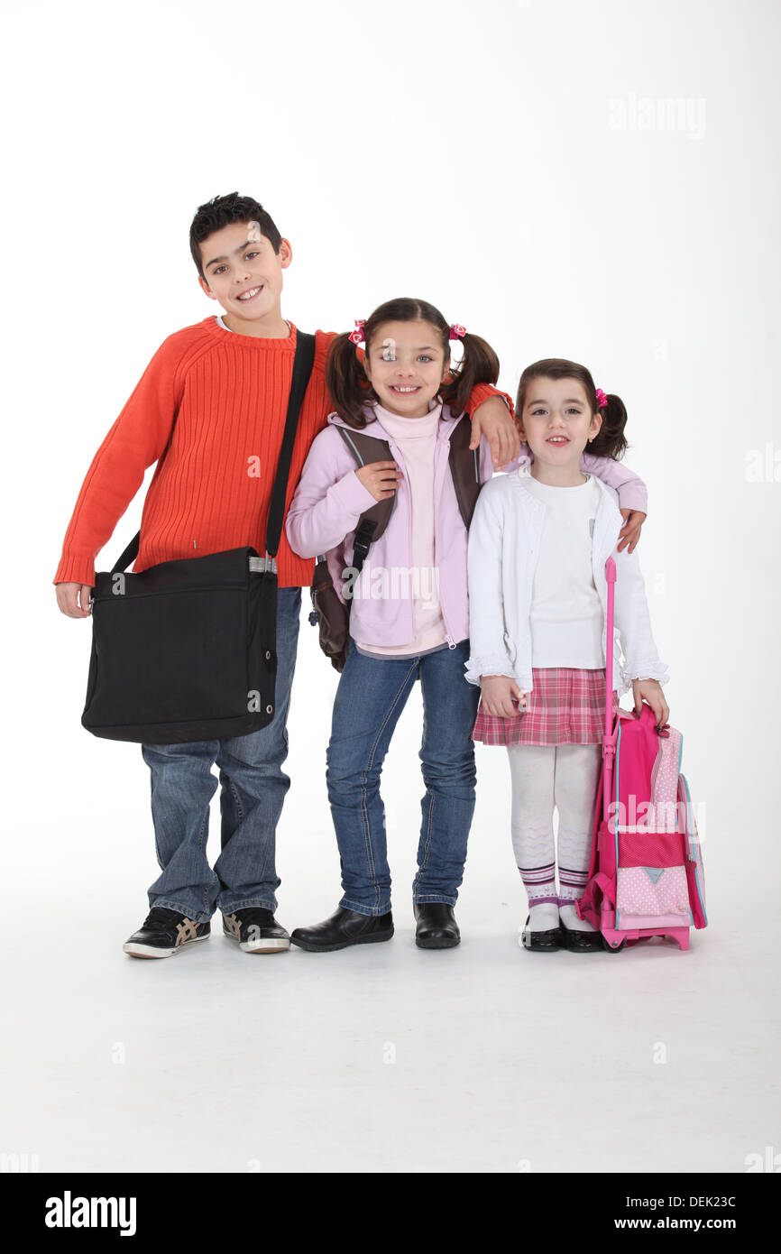 Schoolchildren with backpacks Stock Photo - Alamy