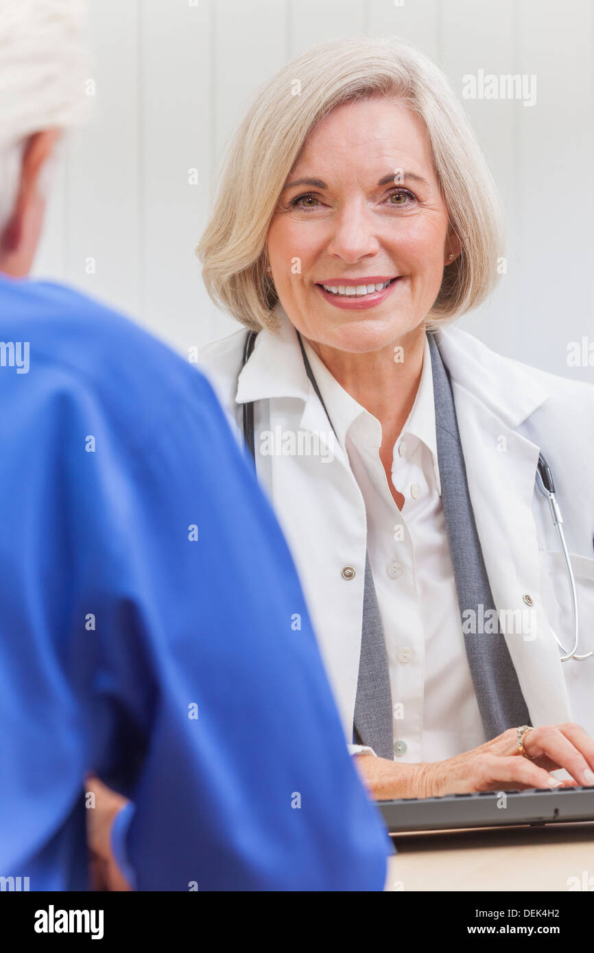 Smart woman at gp hi-res stock photography and images - Alamy