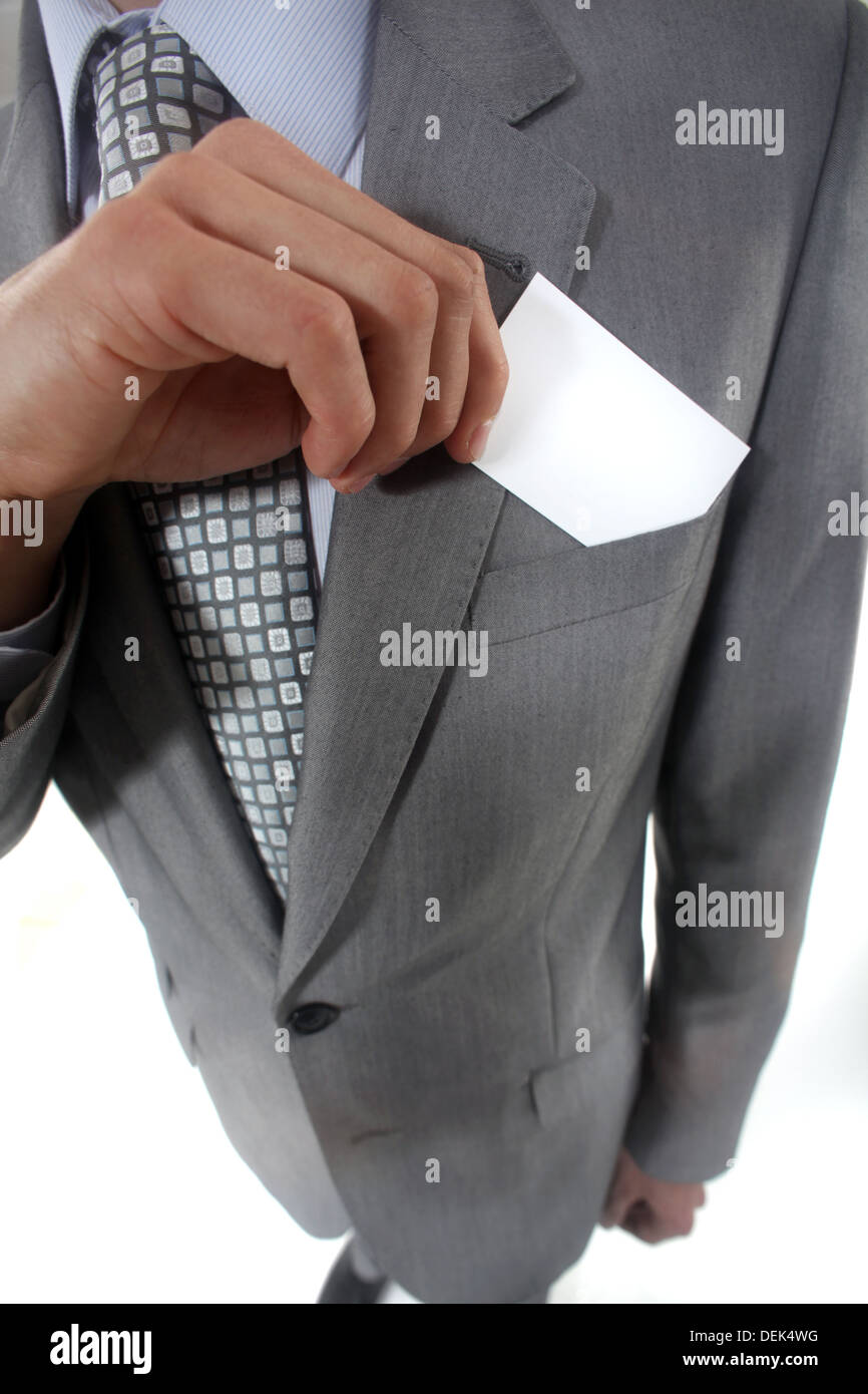 Pulling card out of pocket Stock Photo - Alamy