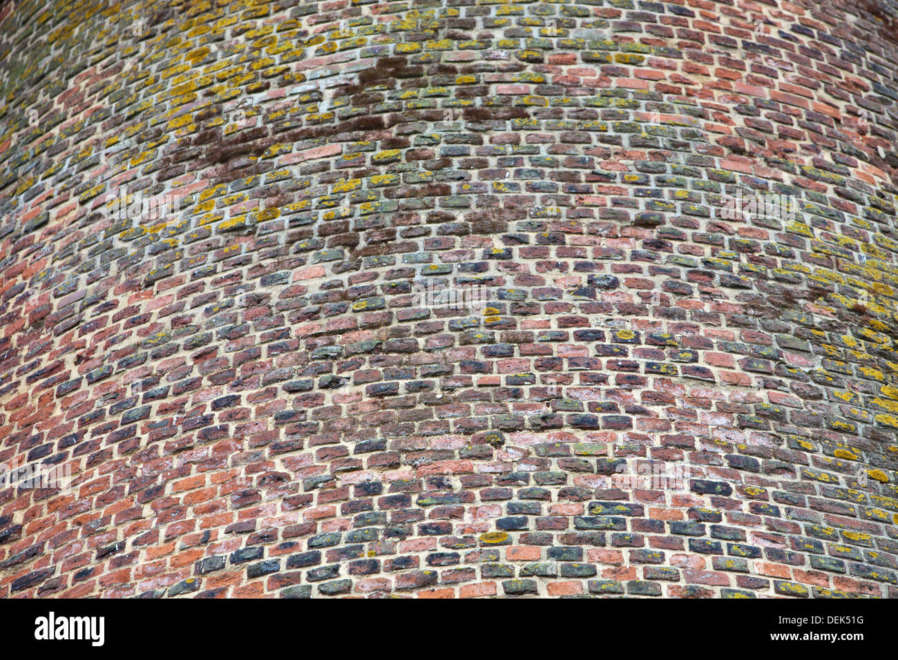 Close-up view red cobbled tower Stock Photo - Alamy