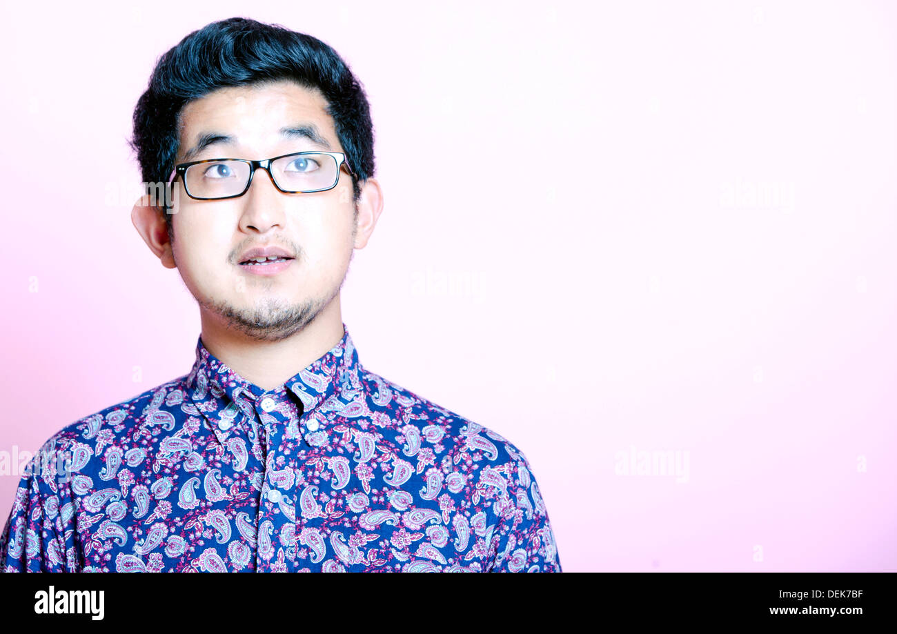 Young asian man wearing glasses hi-res stock photography and images - Alamy