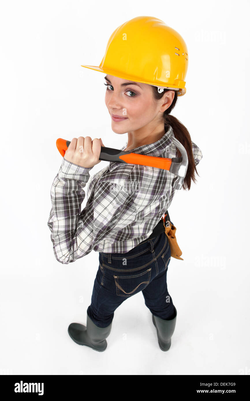 Female construction worker with a hammer Stock Photo - Alamy