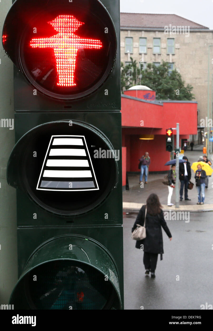 A traffic light with a new countdown signal in the middle is seen at ...