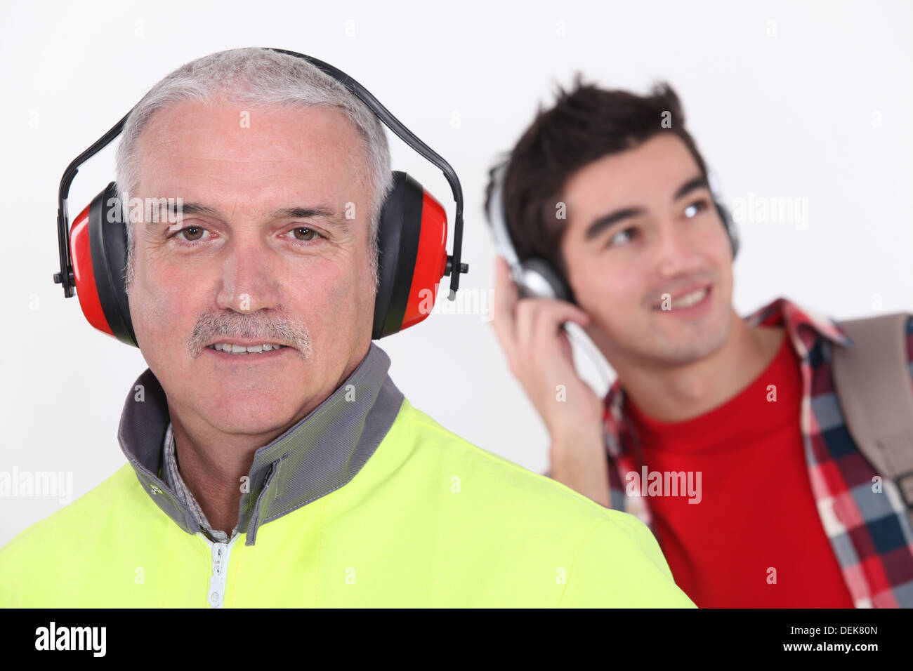 Builder wearing ear protection Stock Photo - Alamy