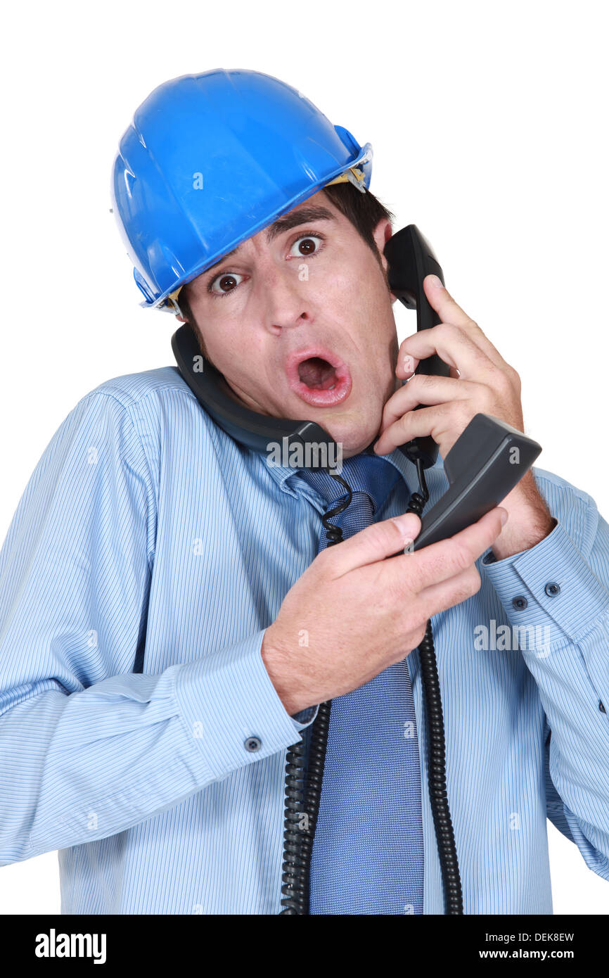 Stressed architect on the telephone Stock Photo - Alamy