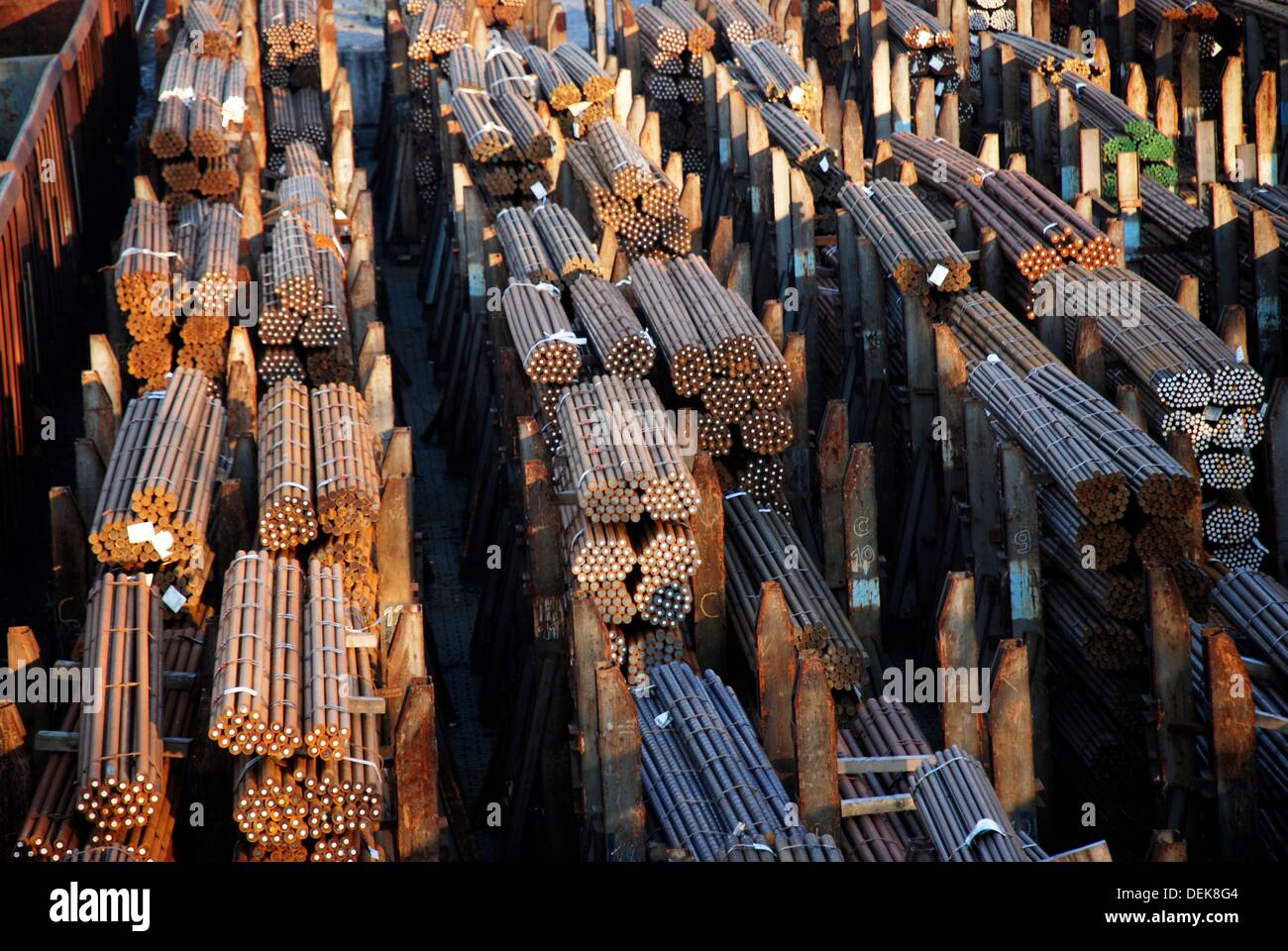 Round steel stock of a metal plant Stock Photo - Alamy