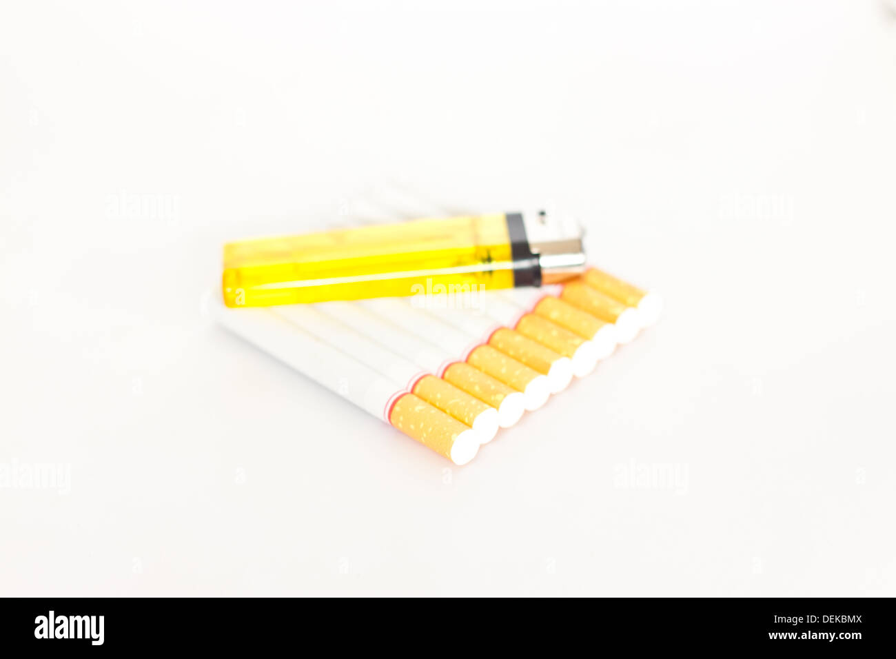 cigarettes on white paper Stock Photo - Alamy