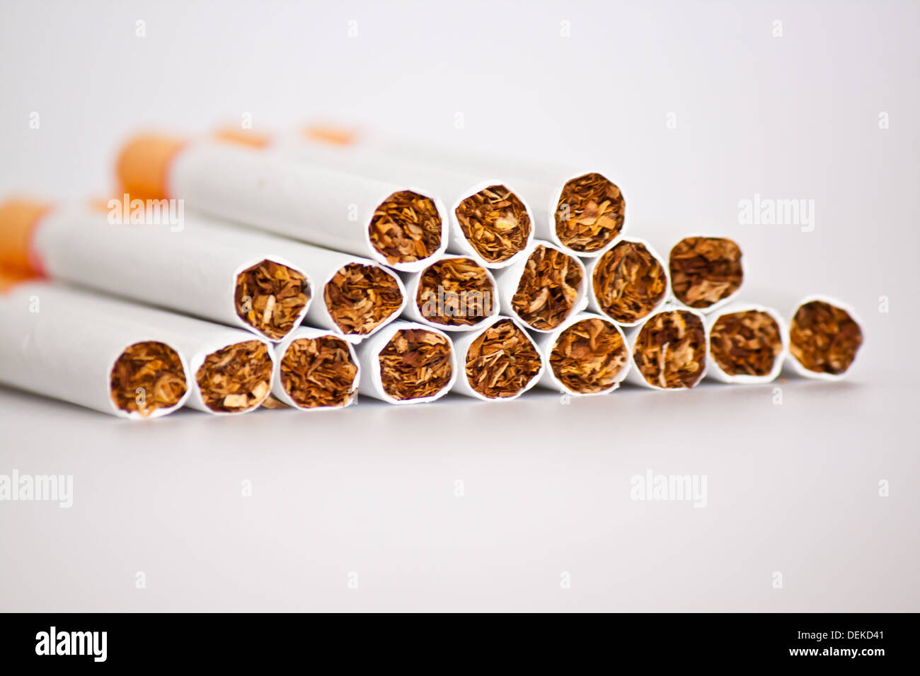 cigarettes on white paper Stock Photo - Alamy