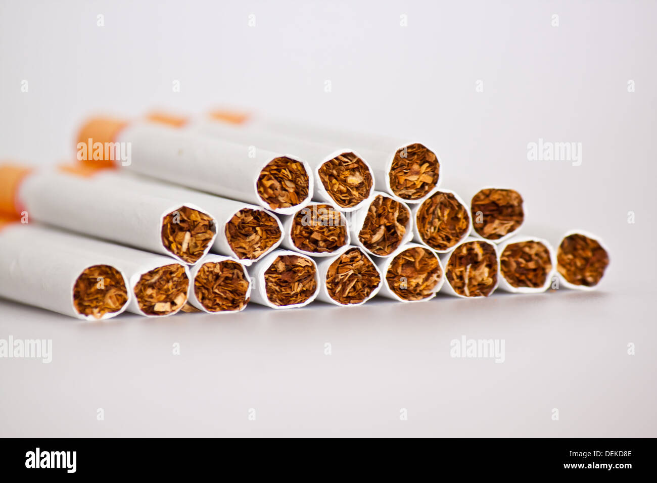 cigarettes on white paper Stock Photo - Alamy