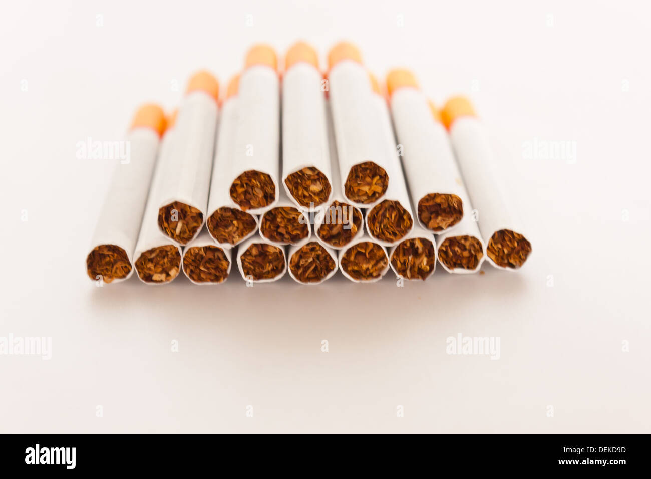 cigarettes on white paper Stock Photo - Alamy
