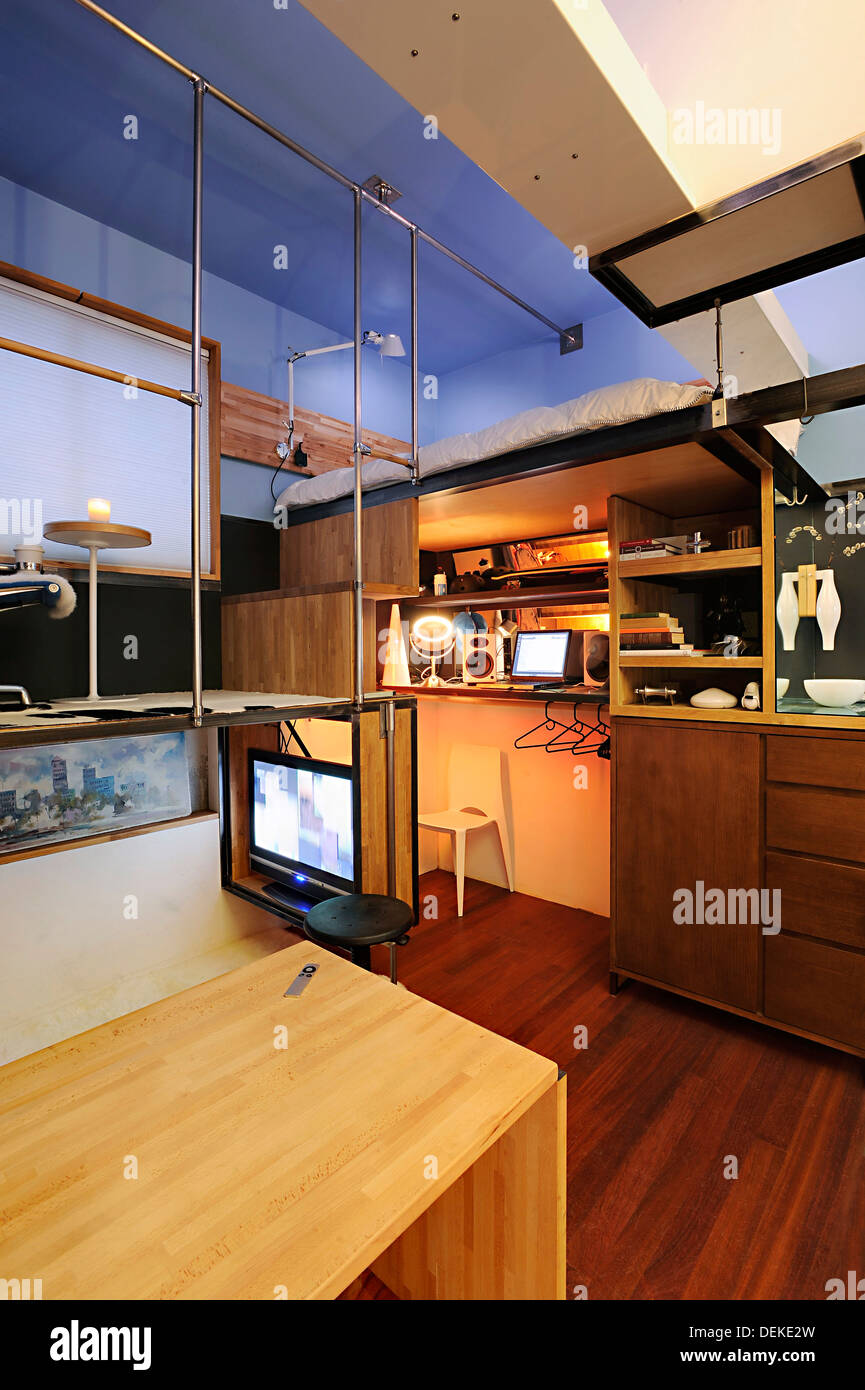 Organized space of compact studio apartment Stock Photo - Alamy
