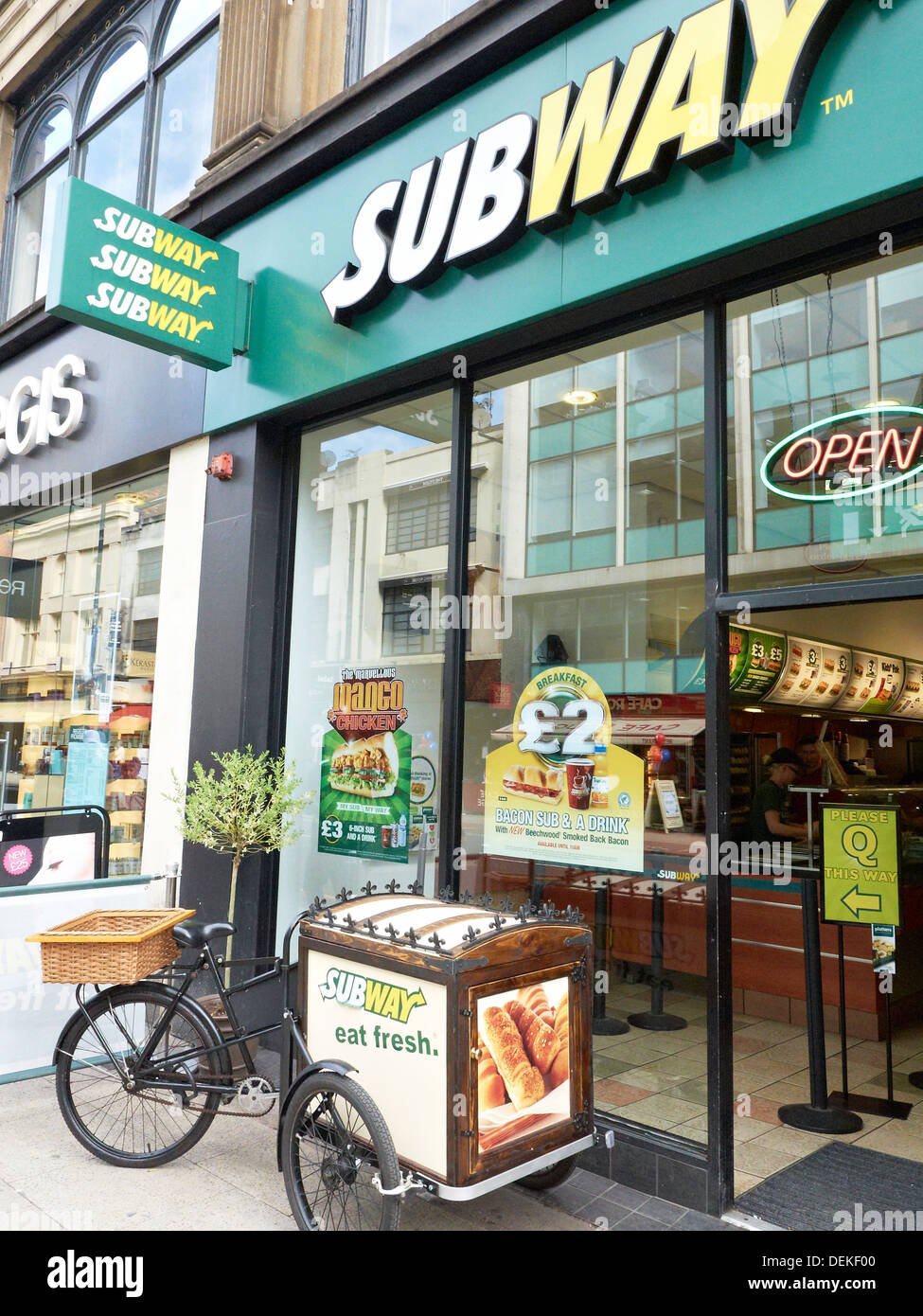 Subway takeaway with delivery tricycle in Manchester UK Stock Photo - Alamy