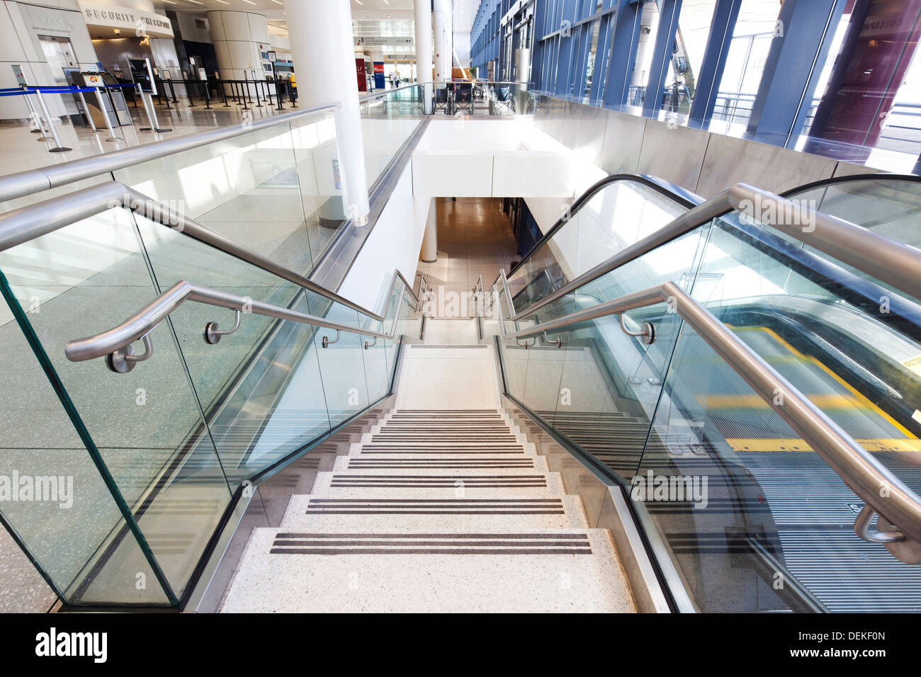 Staircase in airport Stock Photo - Alamy