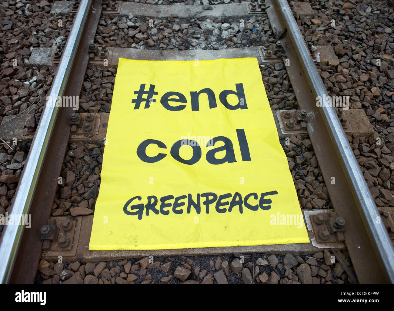 A transparency with the inscription "end coal" lying on a rail track of ...