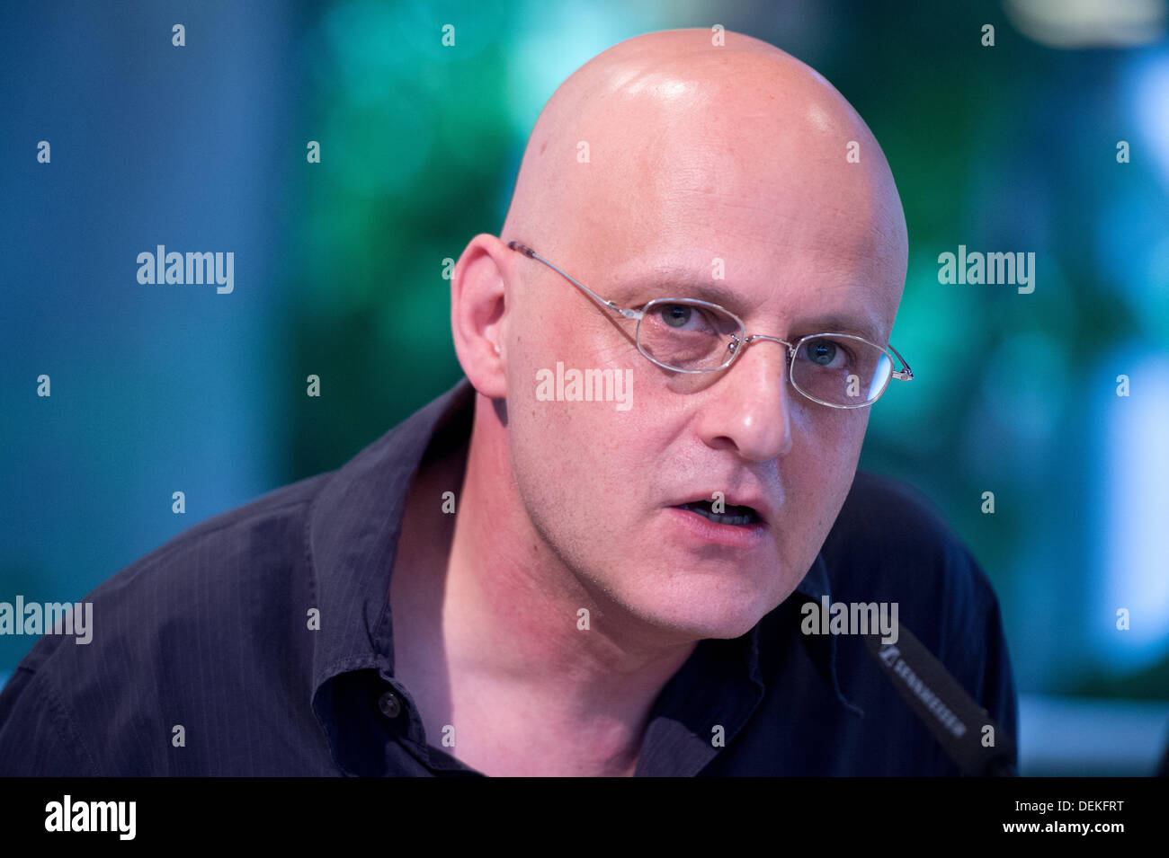 Berlin, Germany. 20th Sep, 2013. Israeli artist Eran Schaerf speaks at ...